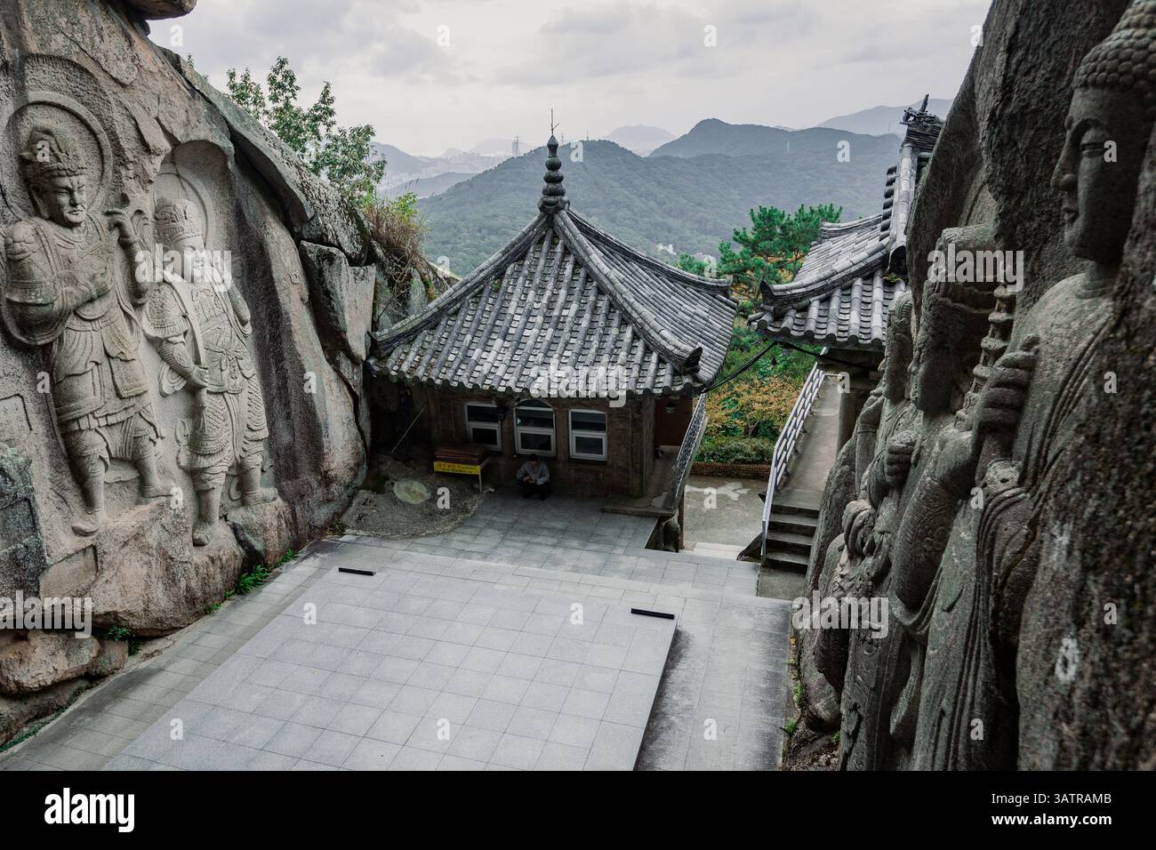Impressive stone carvings in the natural cave at Seokbulsa Temple ...