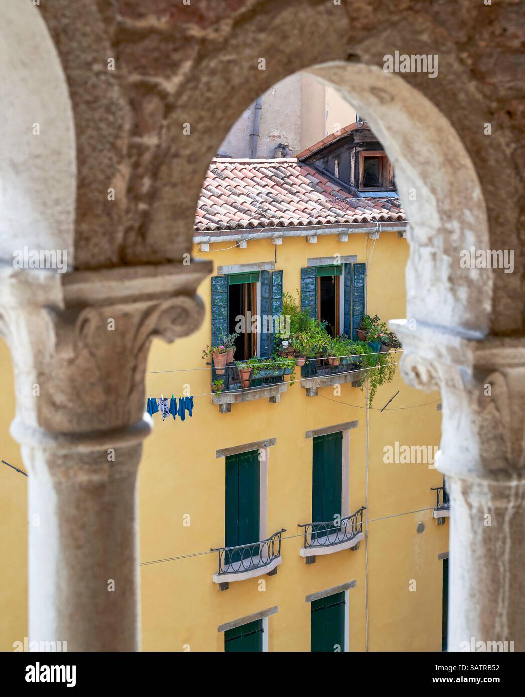 City view from the spiral stairs of Contarini del Bovolo palace. Venice ...