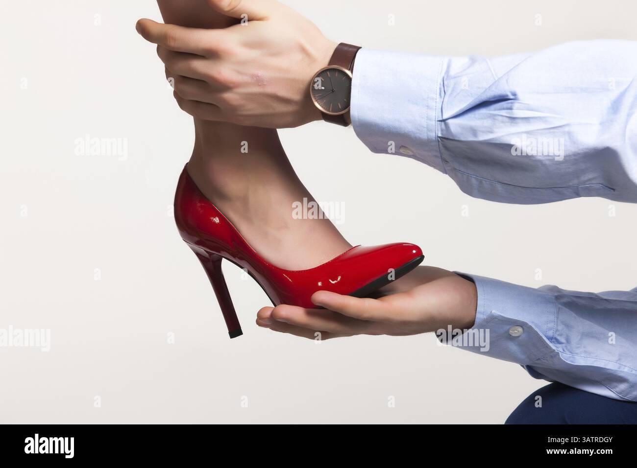 Put on shoe hi-res stock photography and images - Alamy
