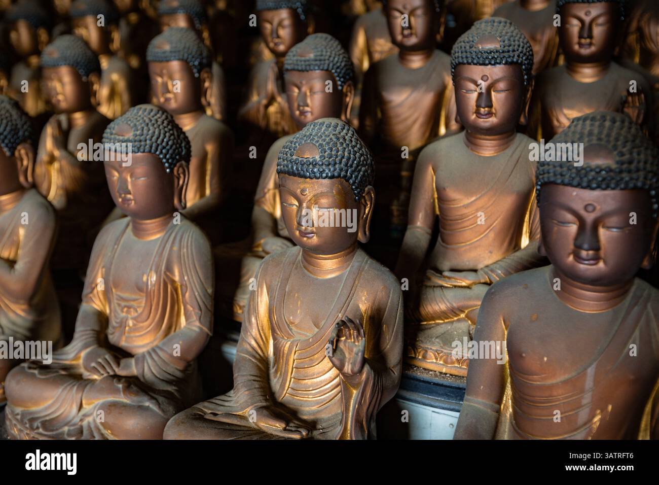 Multiple Buddha statues in Seokbulsa Mountain temple in Busan, South ...