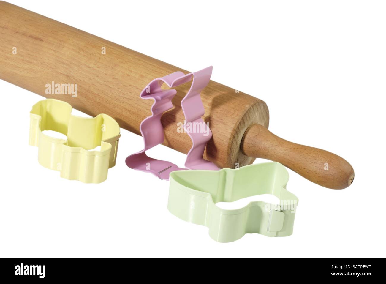 Easter cookie cutters with rolling pin on white background Easter ...