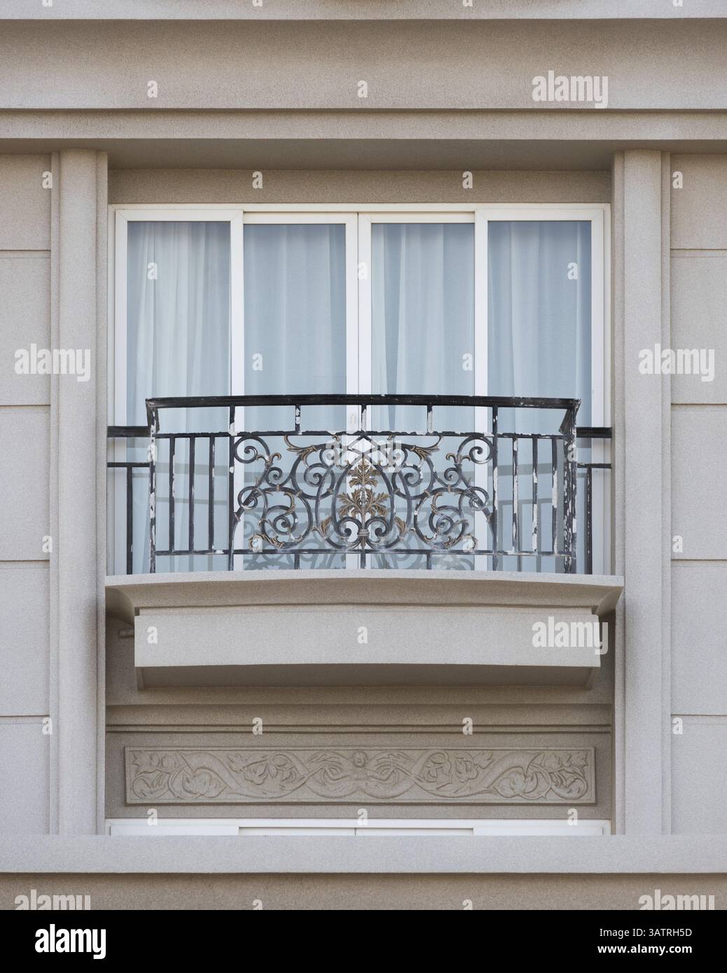A forged balcony in a stone house Stock Photo - Alamy