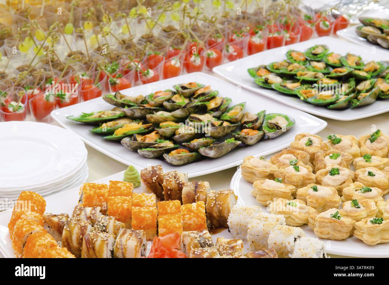 A lot of cold snacks on buffet table, catering Stock Photo - Alamy