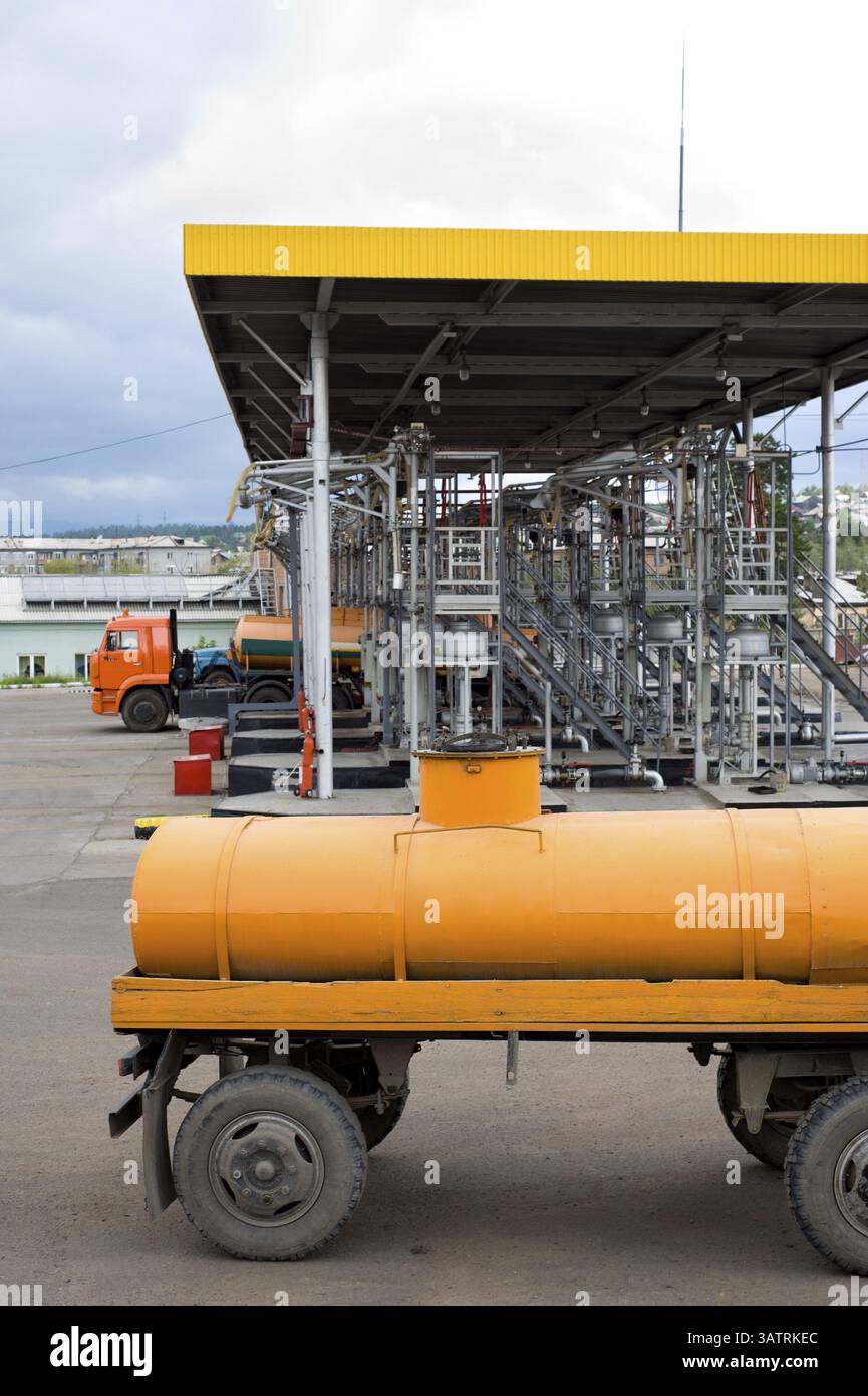 Gas tank truck at oil loading terminal Stock Photo - Alamy