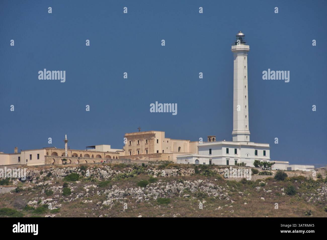 The lighthouse is the town's landmark, built in 1864 on the cape Punta ...