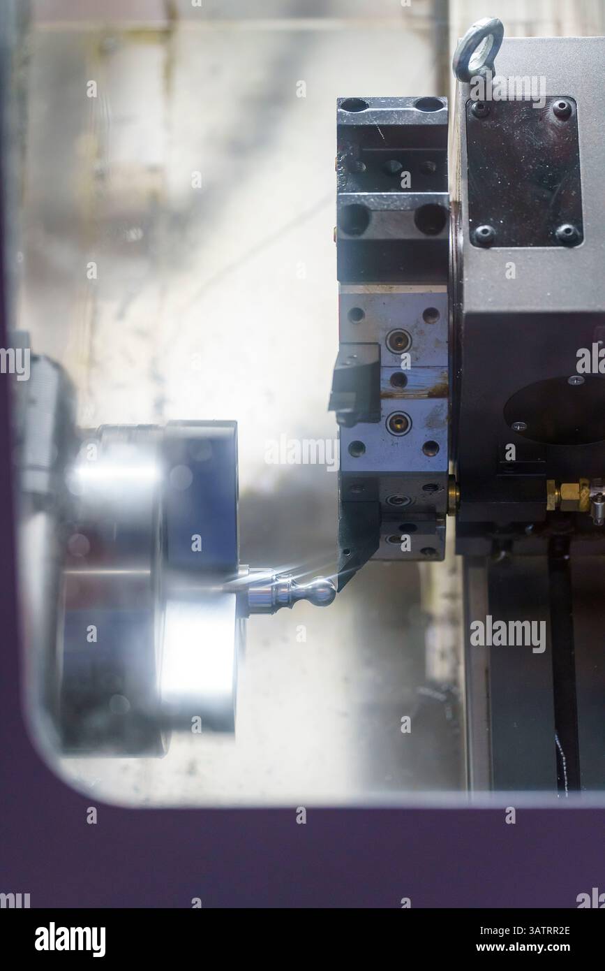 A CNC lathe shapes and cuts the metal parts of the shaft. chuck ...