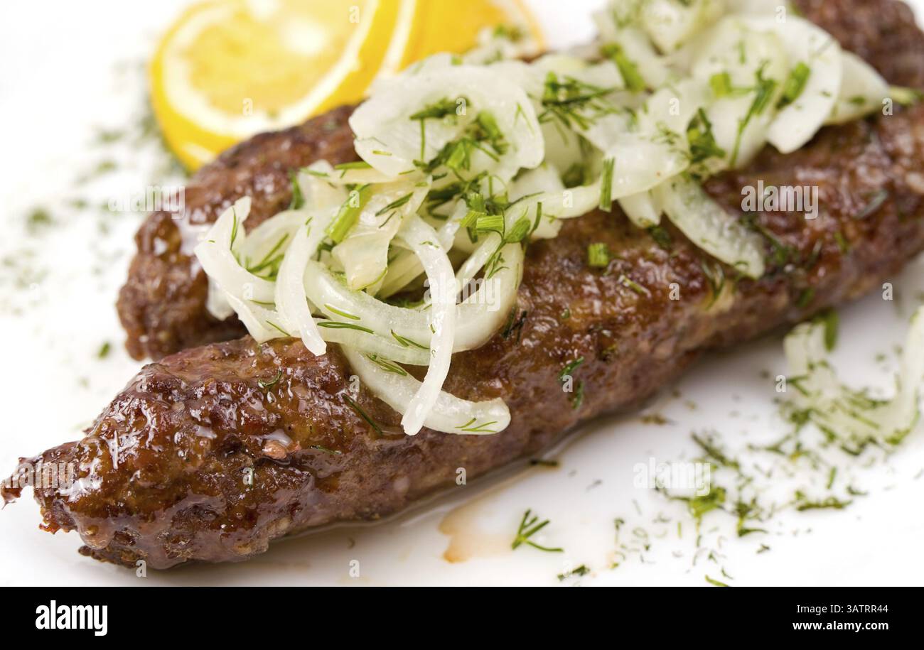 Minced mutton chops fried on skewers, macro Stock Photo - Alamy