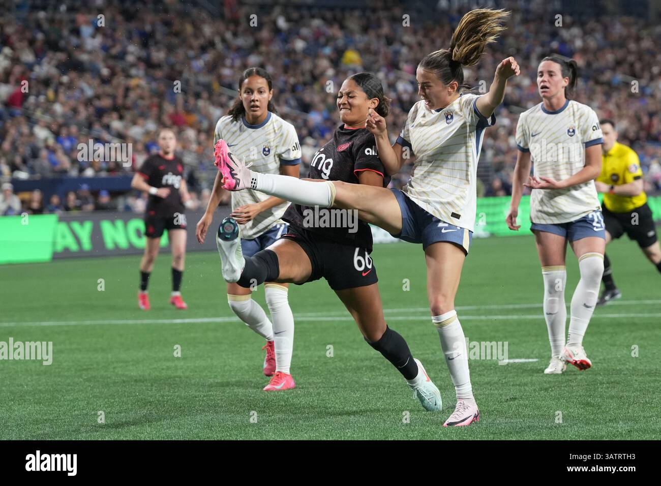 Seattle Reign FC defender Madison Curry (24) and Portland Thorns FC ...