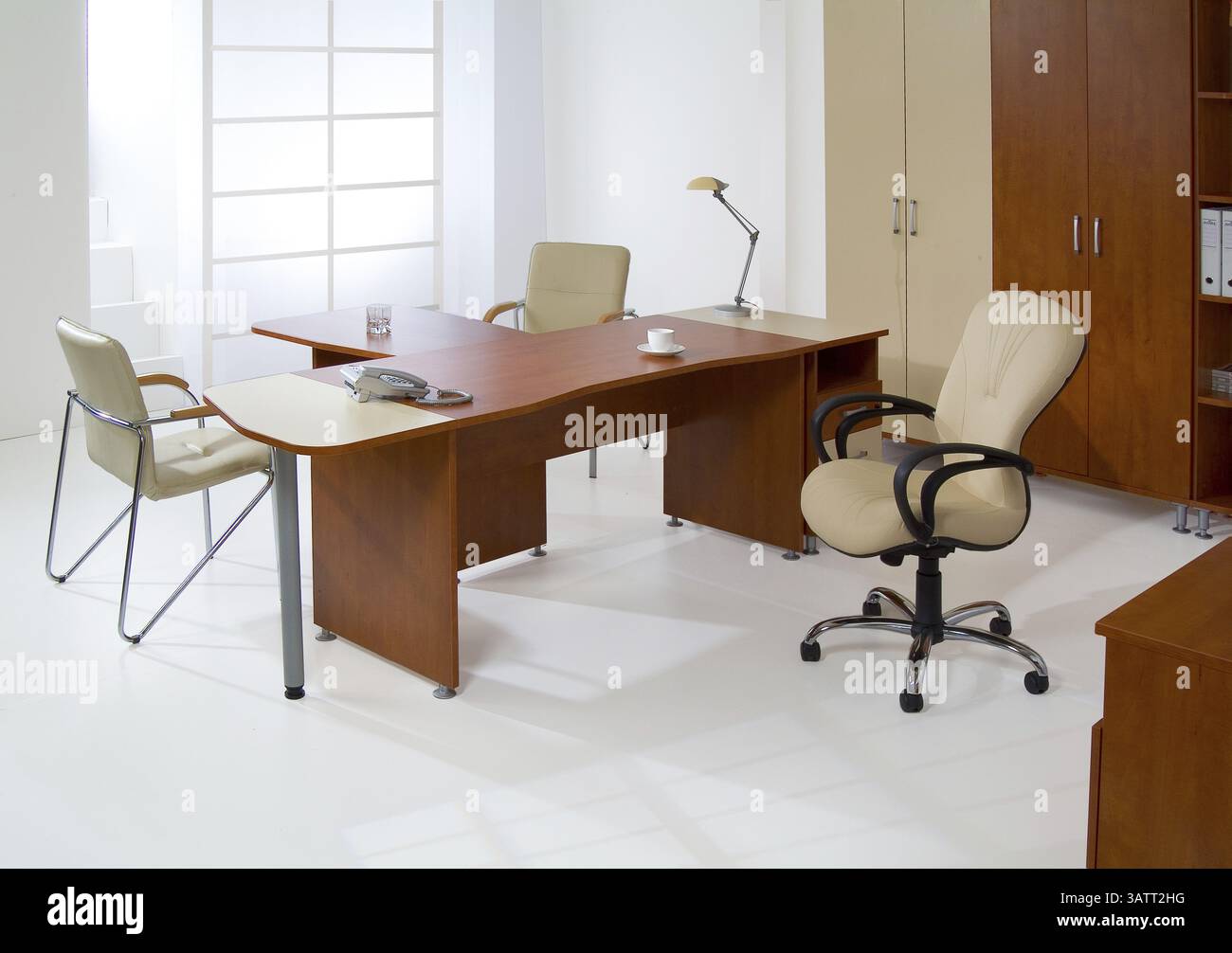 Suite of office furniture on isolated studio background Stock Photo - Alamy