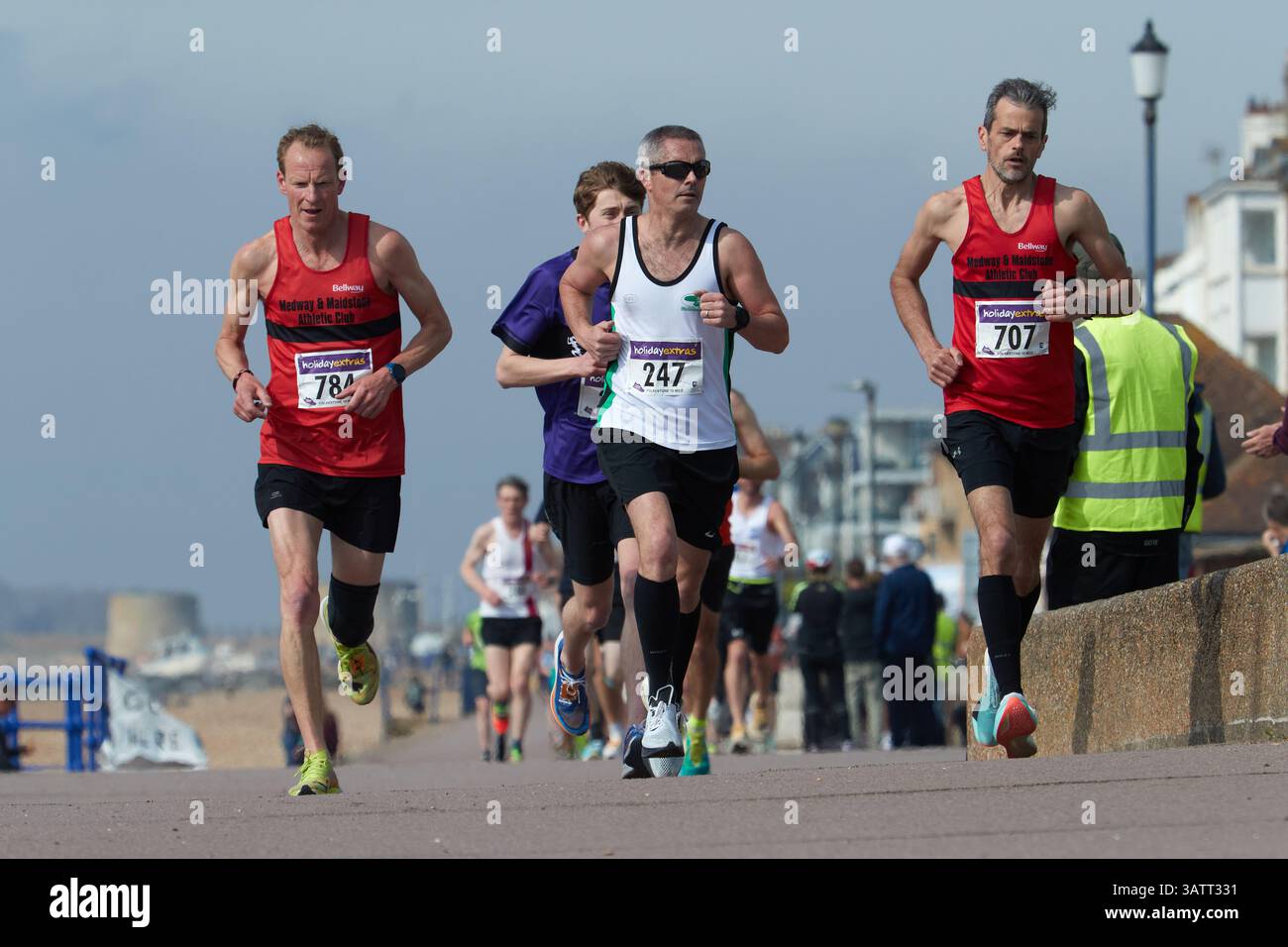 Runners on Marine Parade, Hythe, in the 2025 Folkestone 10 mile race ...