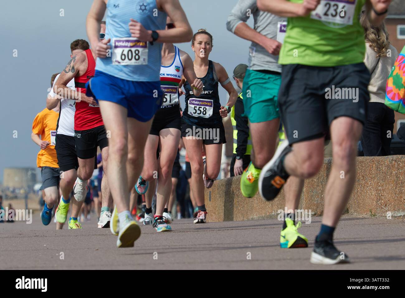 Runners on Marine Parade, Hythe, in the 2025 Folkestone 10 mile race ...