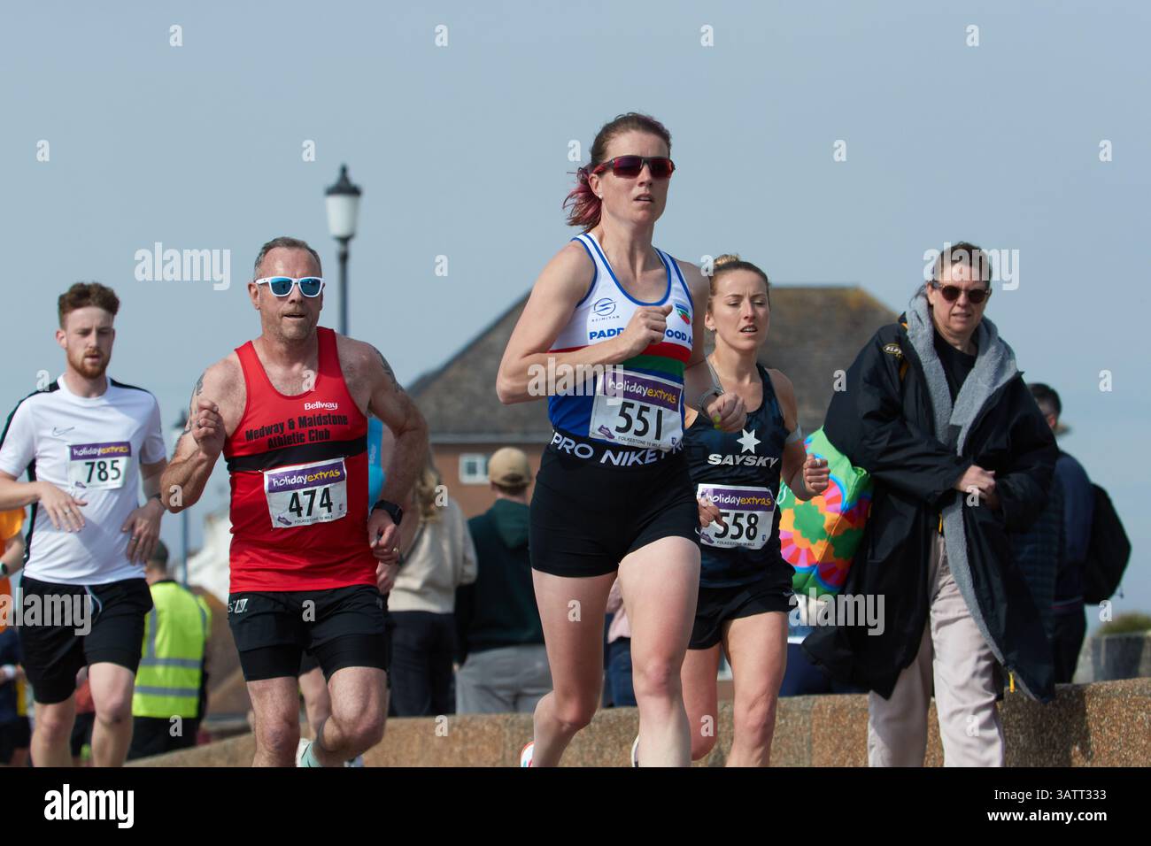Runners on Marine Parade, Hythe, in the 2025 Folkestone 10 mile race ...