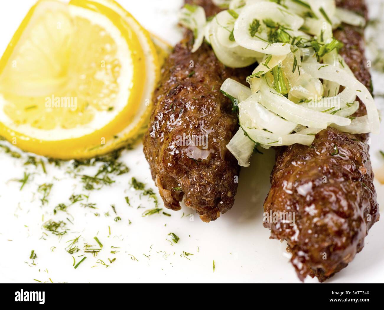Minced mutton chops fried on skewers, macro Stock Photo - Alamy