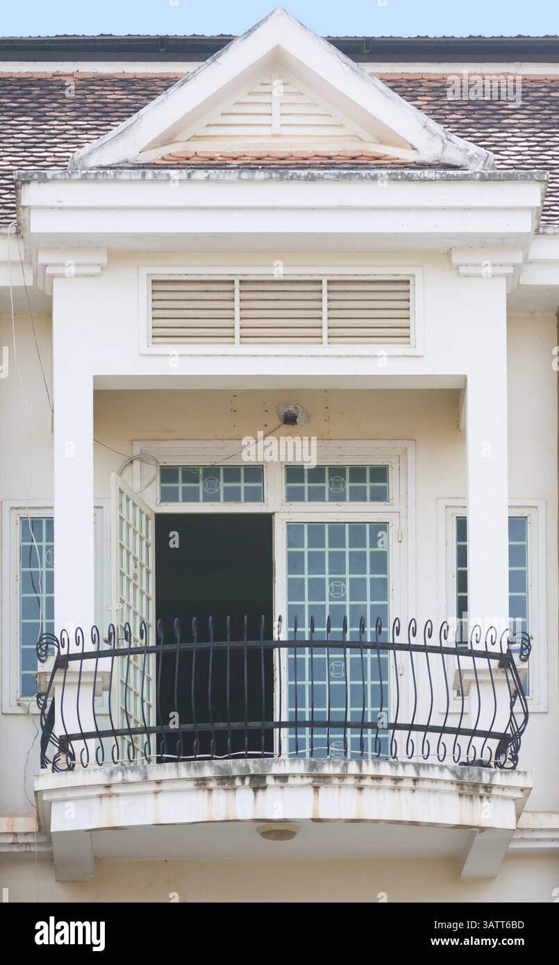 A forged balcony in a colonial style house Stock Photo - Alamy