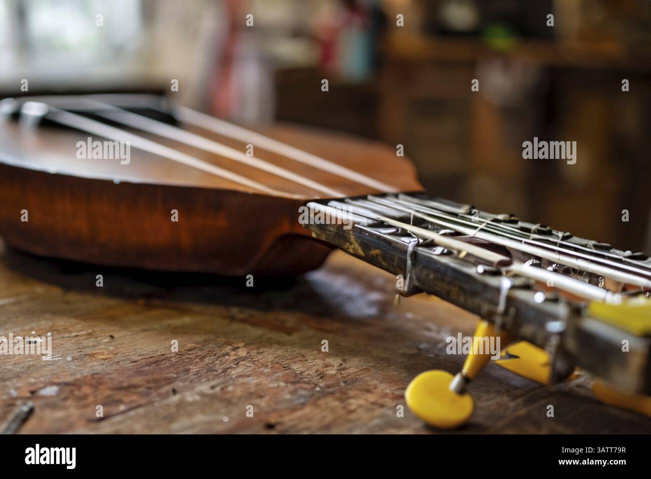Interior of an old musical workshop with musical instruments and tools ...