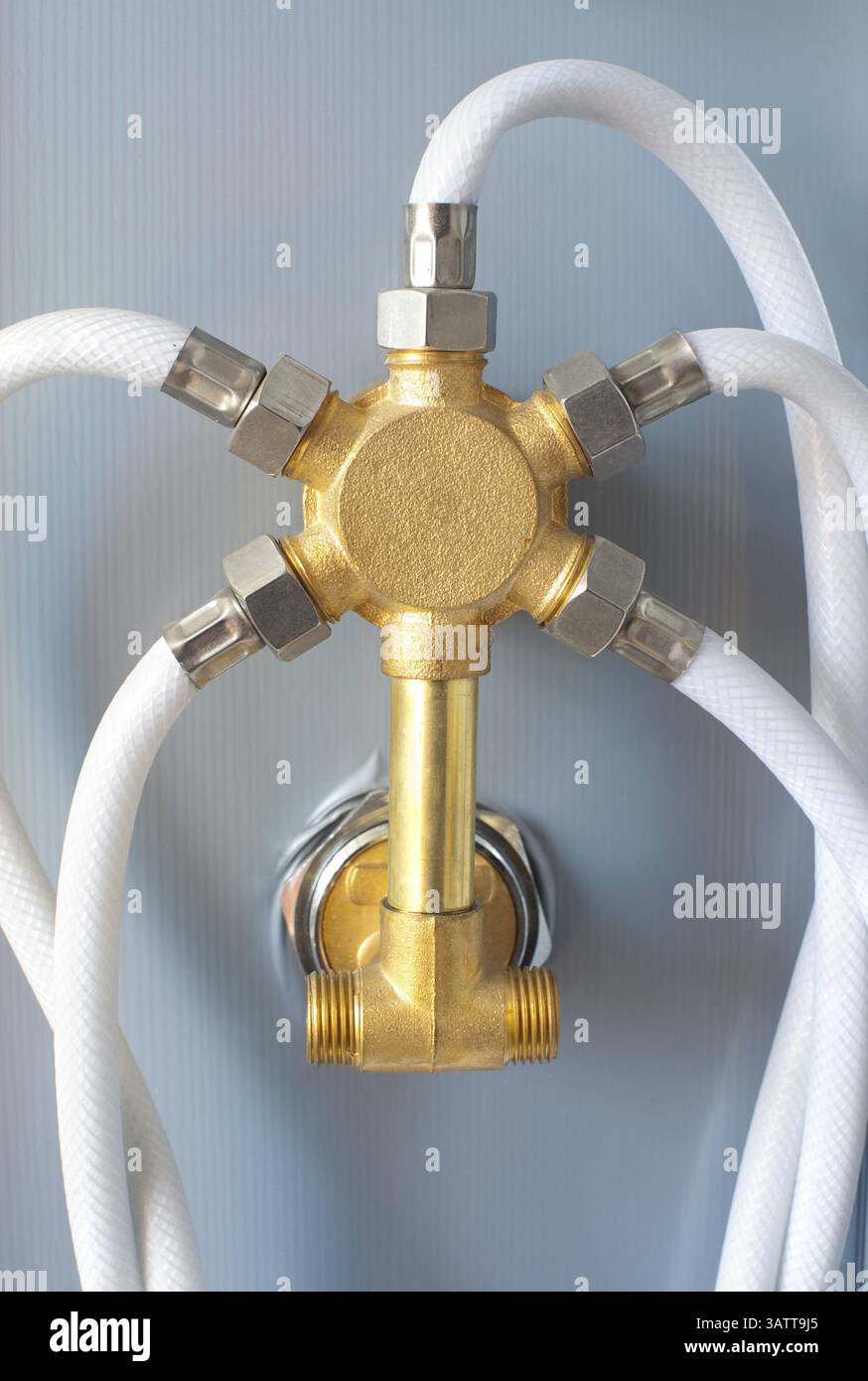A splitter for water supply at the back of a shower cubicle Stock Photo ...