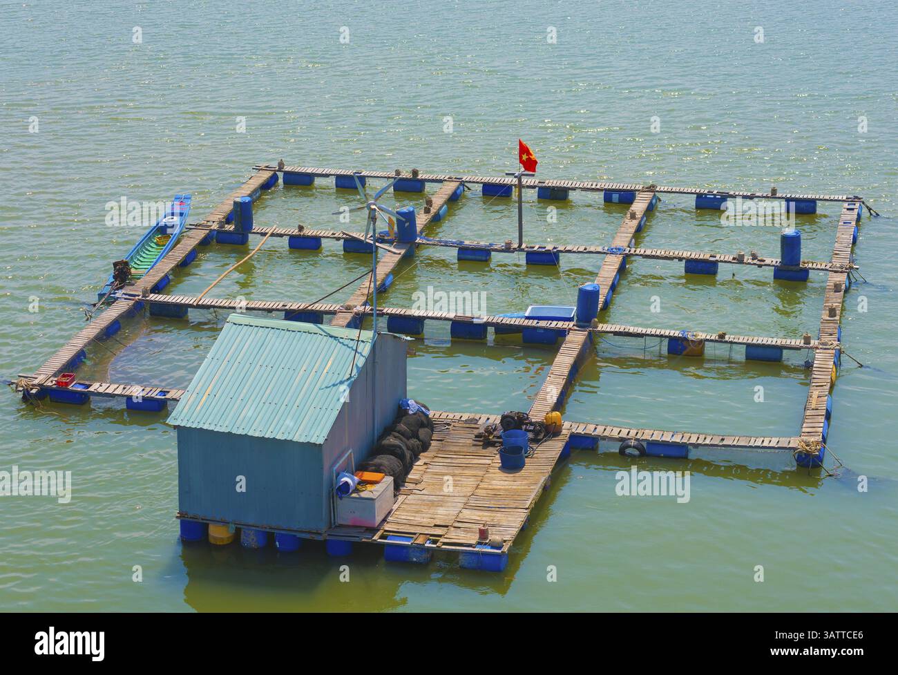 Fish breeding farms on a river in the southern Vietnam Stock Photo - Alamy