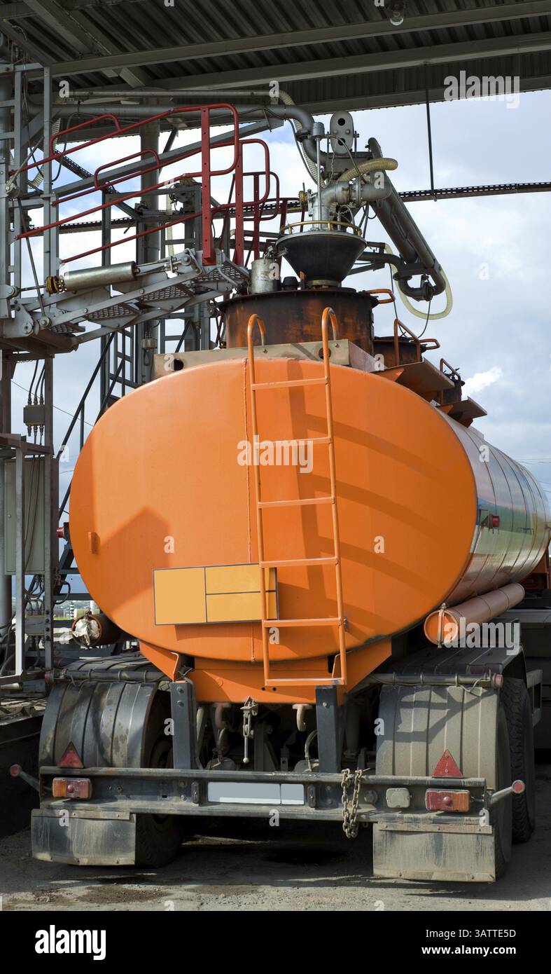 Gas tank truck at oil loading terminal Stock Photo - Alamy
