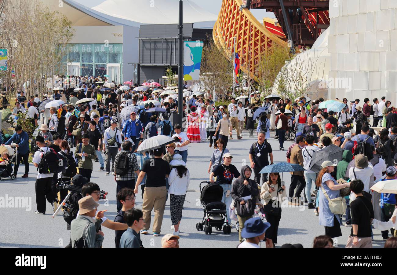 The photo shows the venue of the Osaka-Kansai Expo 2025, crowded with ...