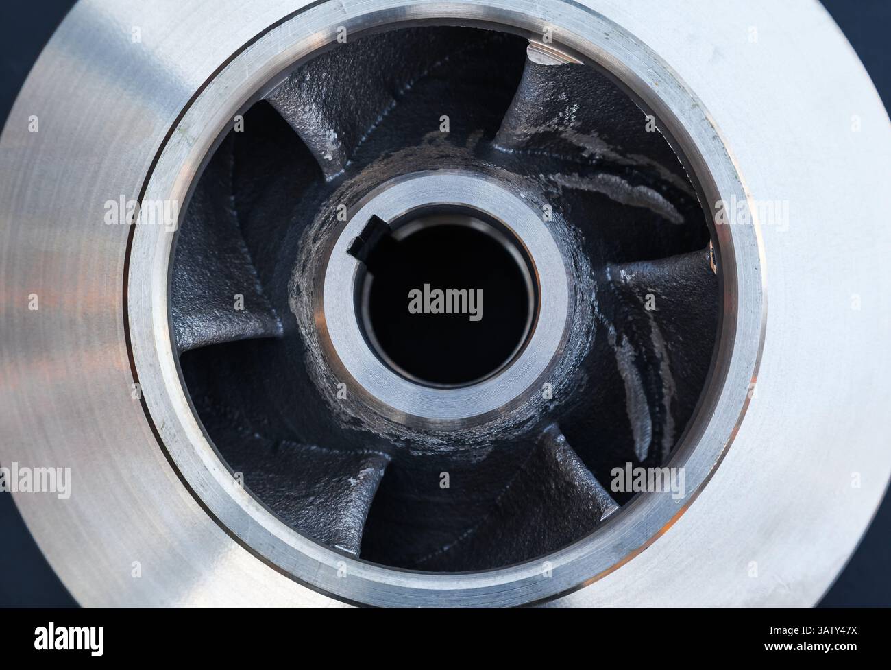 New bronze impeller for a large motor, close-up Stock Photo - Alamy