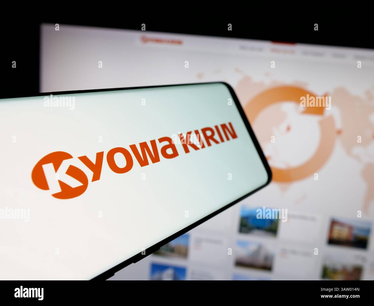 In this photo illustration, a smartphone with the logo of Japanese biotech company Kyowa Kirin ...