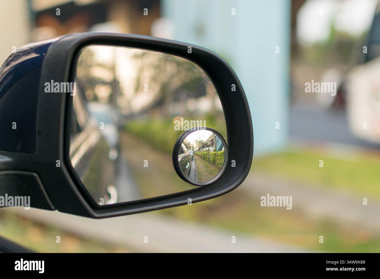 Car side mirror for rear view with traffic reflection background Stock ...