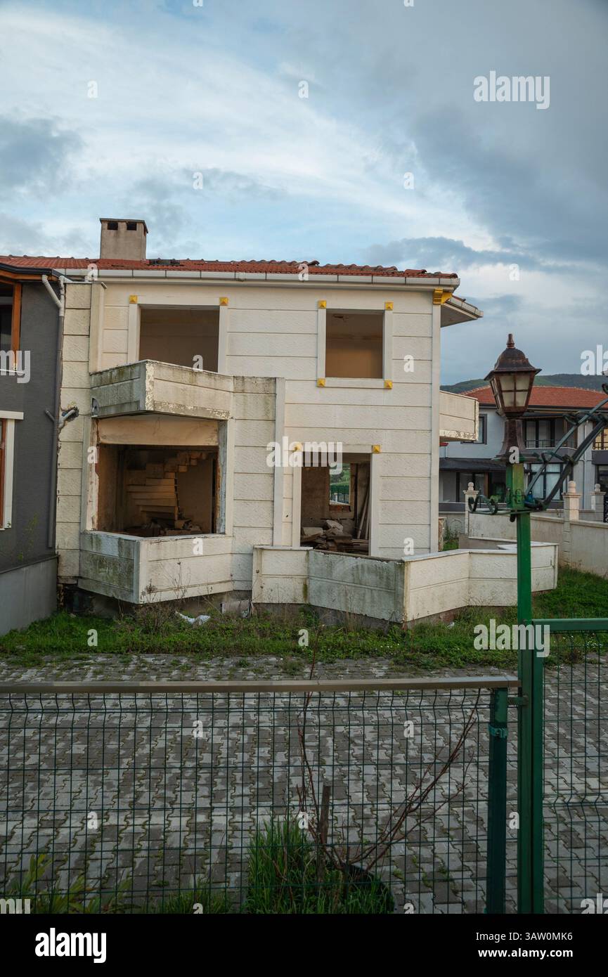 Old house without windows and door.destroyed building Stock Photo - Alamy