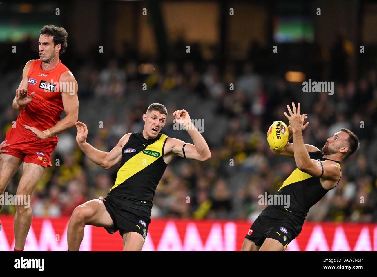 Noah Balta of Richmond (right) in action during the AFL Round 6 match ...