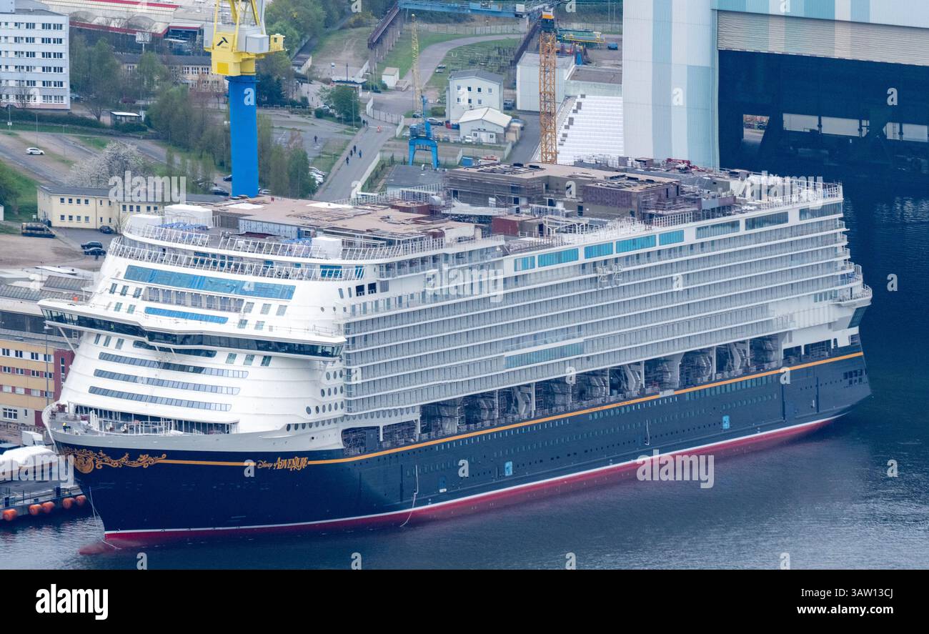 Wismar, Germany. 19th Apr, 2025. The cruise ship "Disney Adventure" is ...