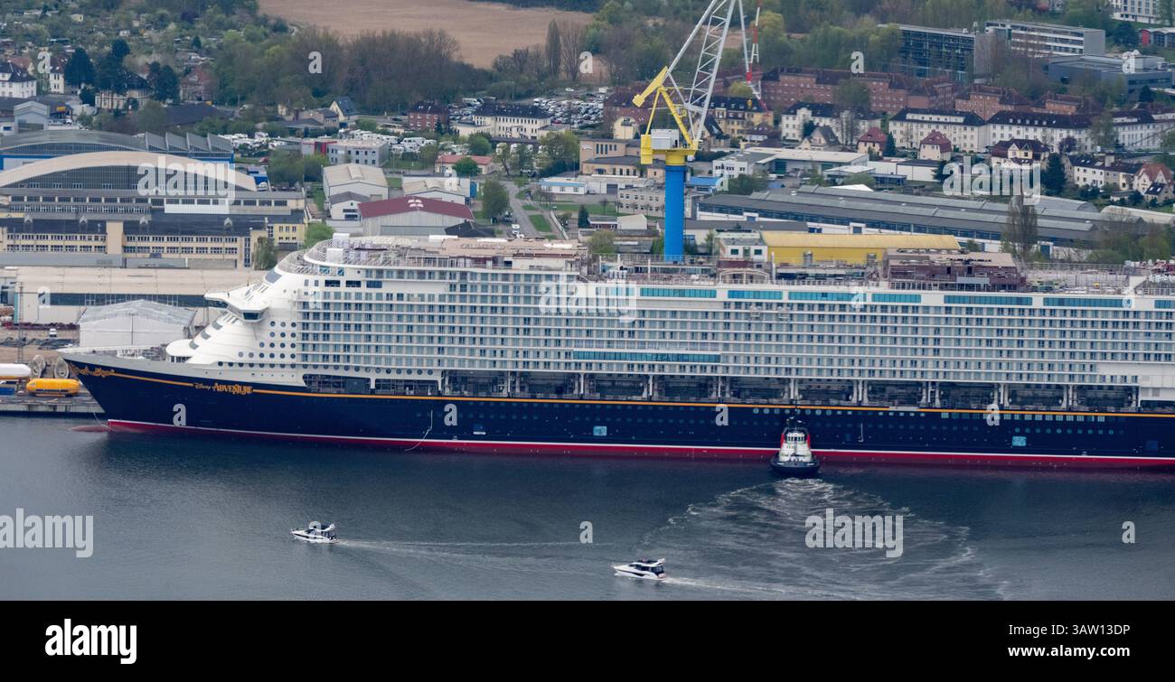 Wismar, Germany. 19th Apr, 2025. The cruise ship "Disney Adventure" is ...