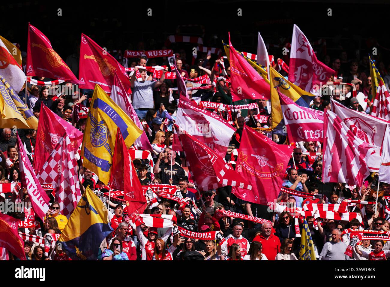 Arsenal fans wave flags on the stands during the women's Champions ...