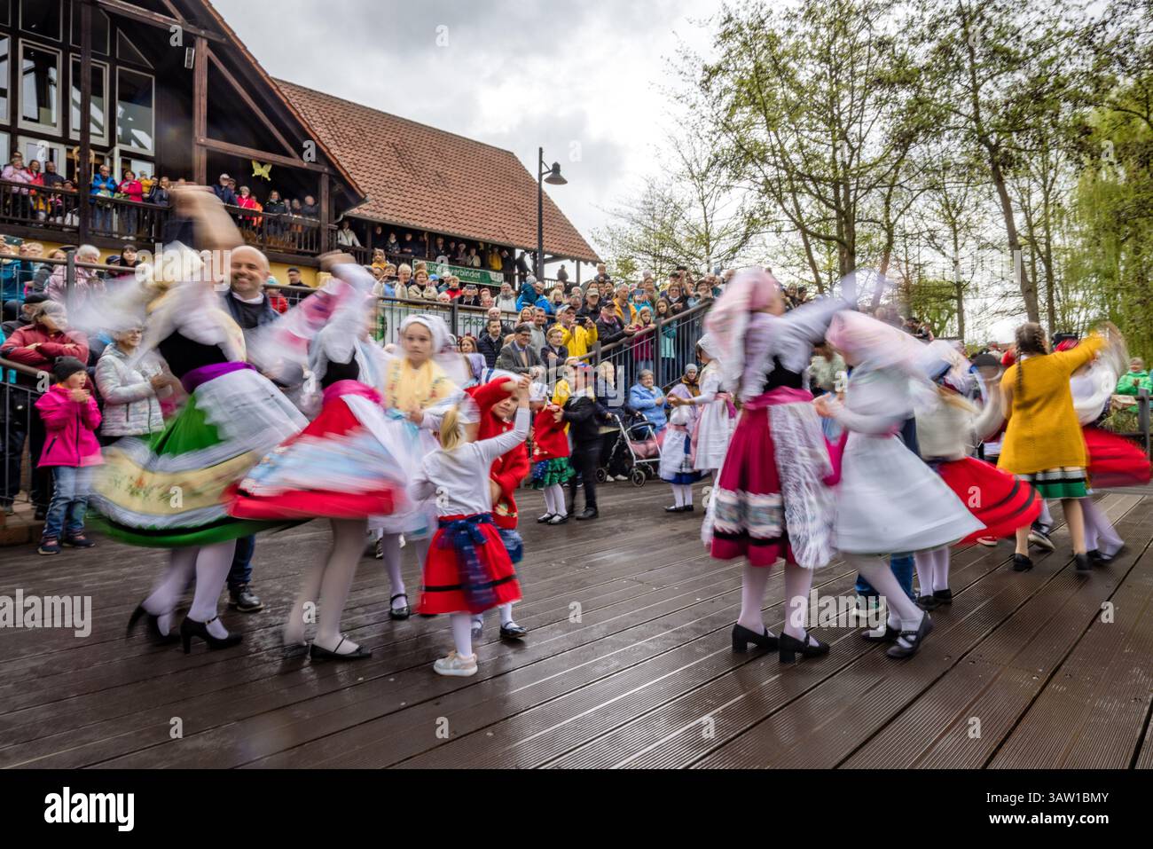 19 April 2025, Brandenburg, Lübben: Children from the Lutki dance group ...