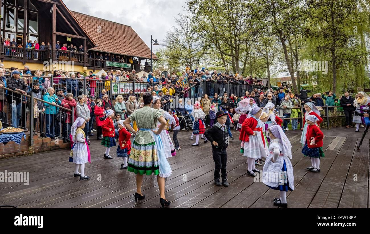 19 April 2025, Brandenburg, Lübben: Children from the Lutki dance group ...