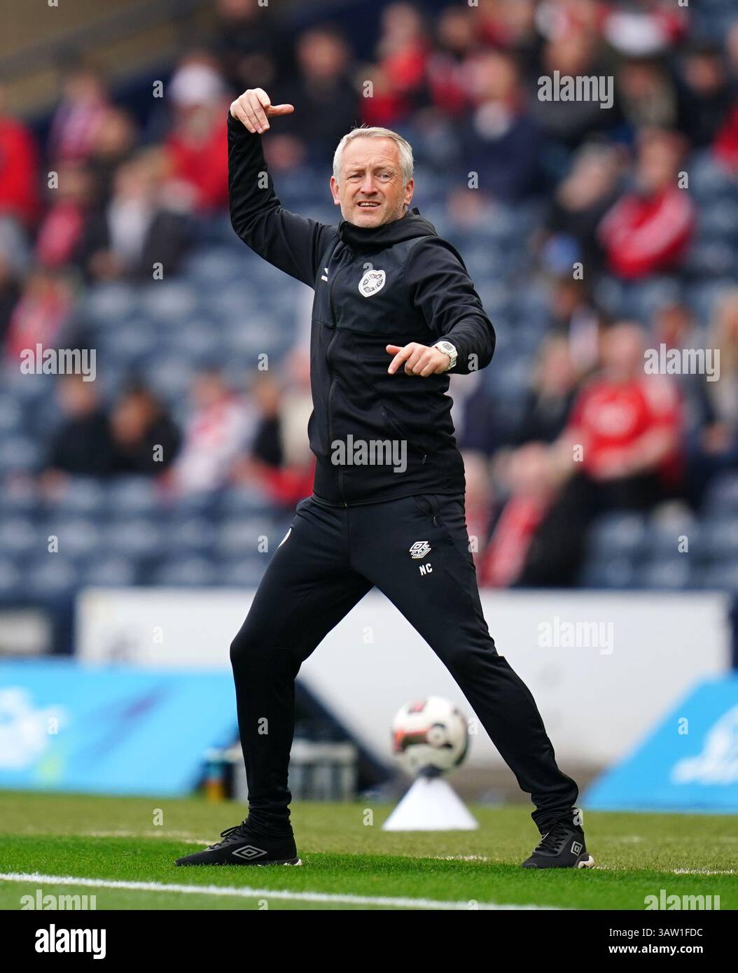 Heart of Midlothian manager Neil Critchley gestures on the touchline ...