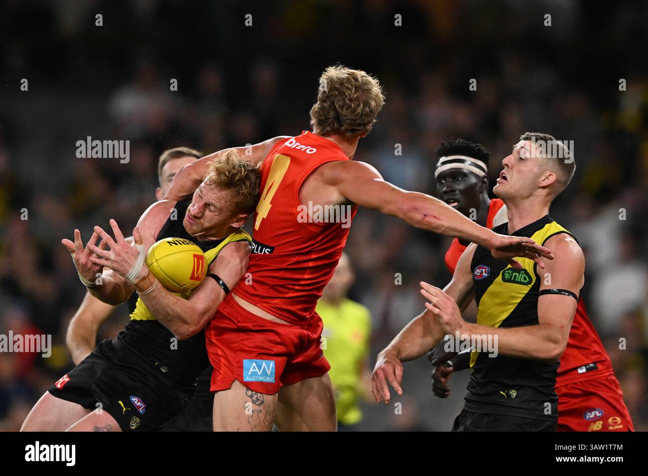 Melbourne, Australia. 19th Apr, 2025. Nick Vlastuin of Richmond (left ...