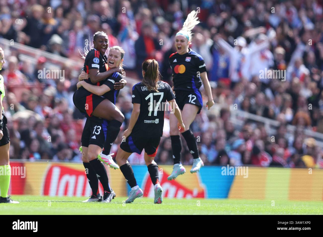 London, UK. 19th Apr, 2025. Kadidiatou Diani (L) of Lyon celebrates ...