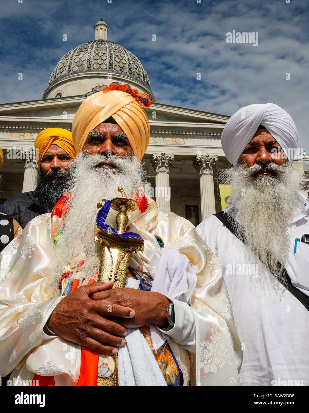 London, UK. 19th Apr, 2025. A group in traditional Sikh dress and ...