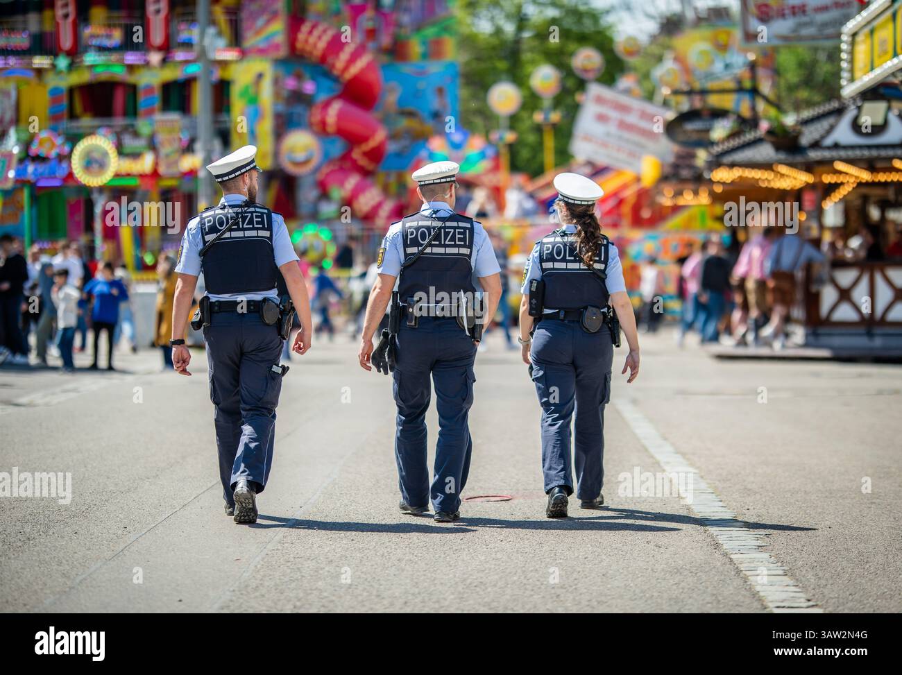 19 April 2025, Baden-Württemberg, Stuttgart: Police officers patrol the ...