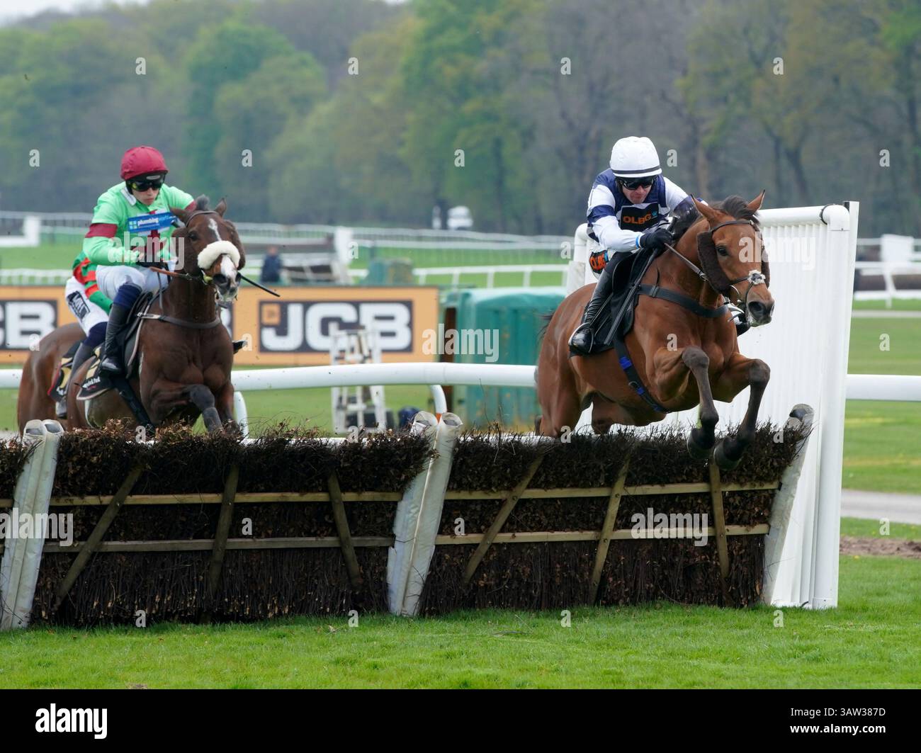 Givemefive (right) ridden by jockey Paul O'Brien on their way to ...