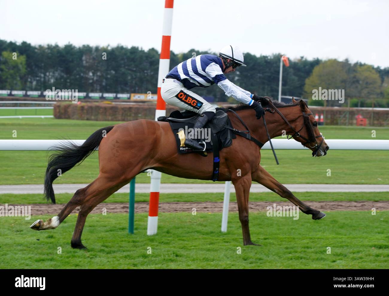 Givemefive ridden by jockey Paul O'Brien on their way to winning the ...