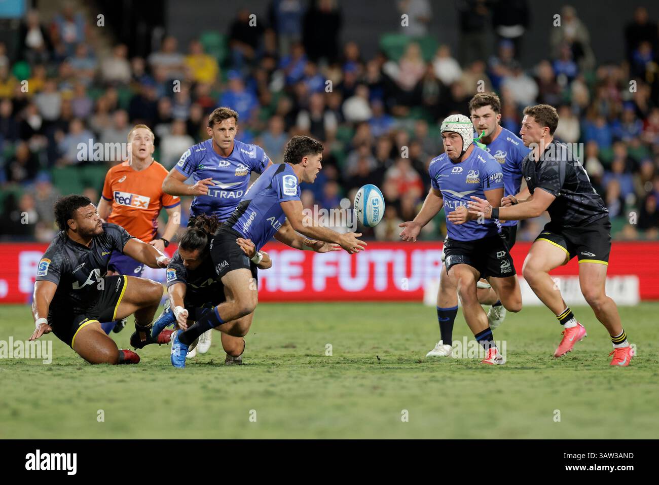 Ben Donaldson of the Force passes the ball to Mac Grealy during the ...