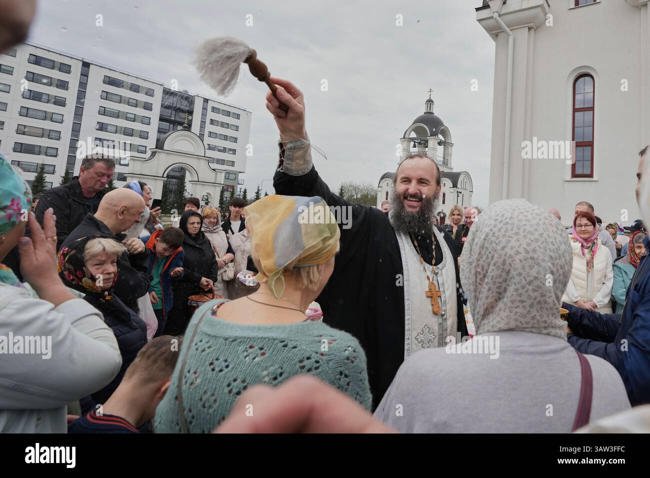Orthodox priest Father Nikolai blesses believers and their traditional ...