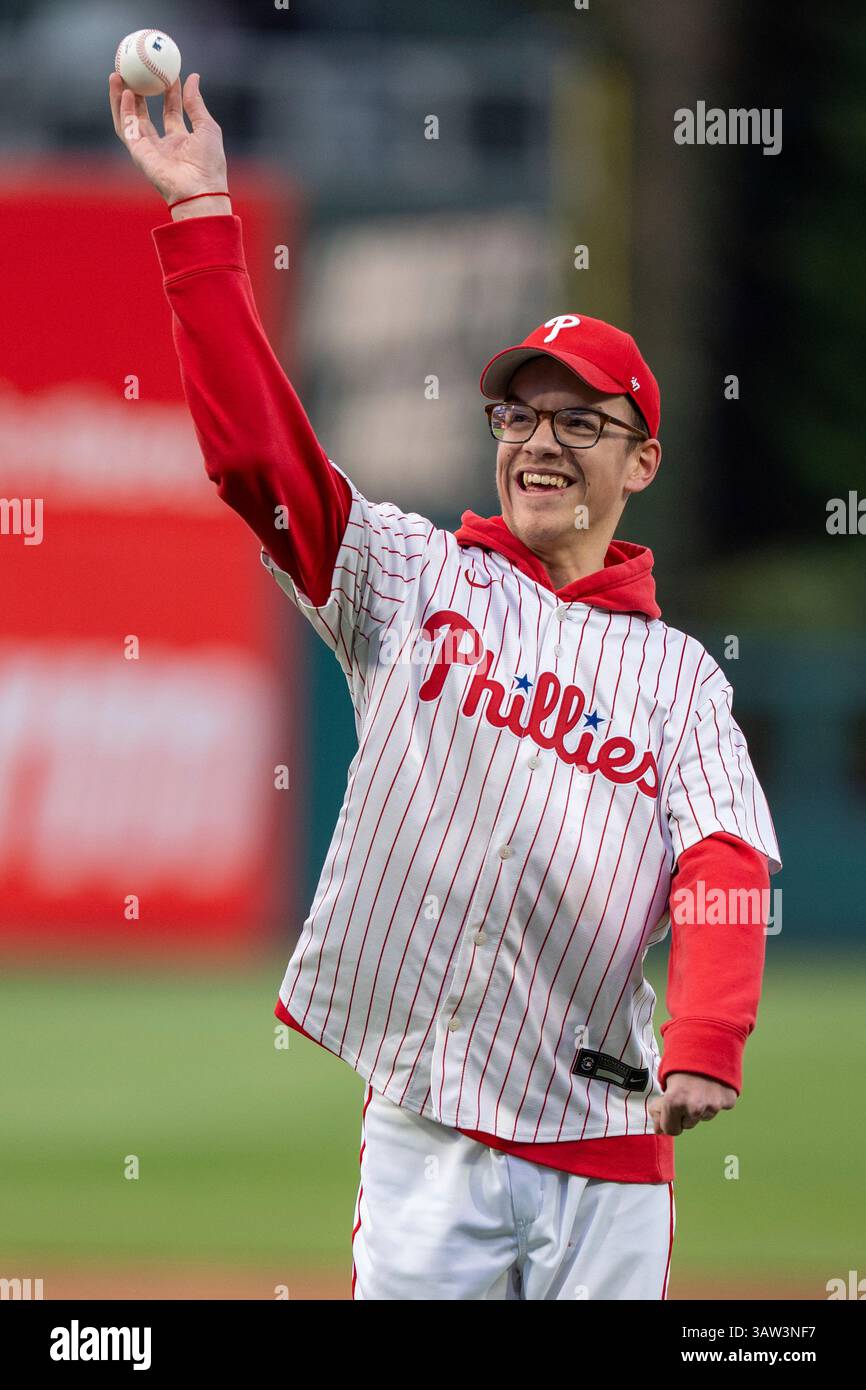 Cain Sweeney throws out the ceremonial first pitch during the baseball ...