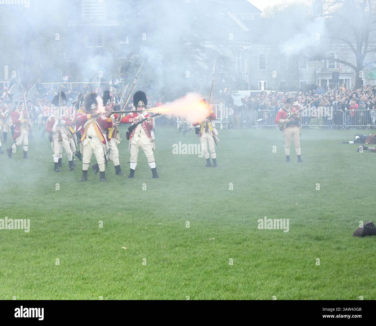 British Regulars fire their muskets at the 250th anniversary ...