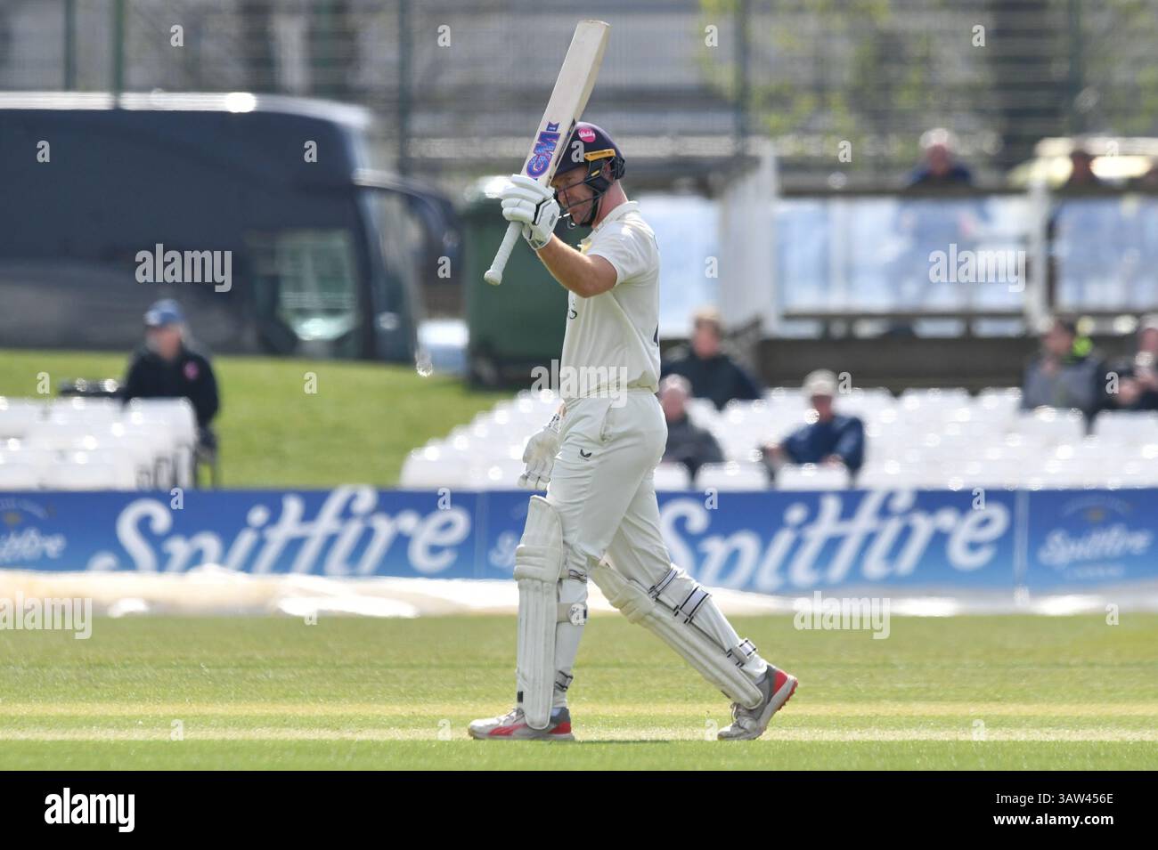 Canterbury, England. 19th Apr 2025. Ben Compton celebrates reaching a ...
