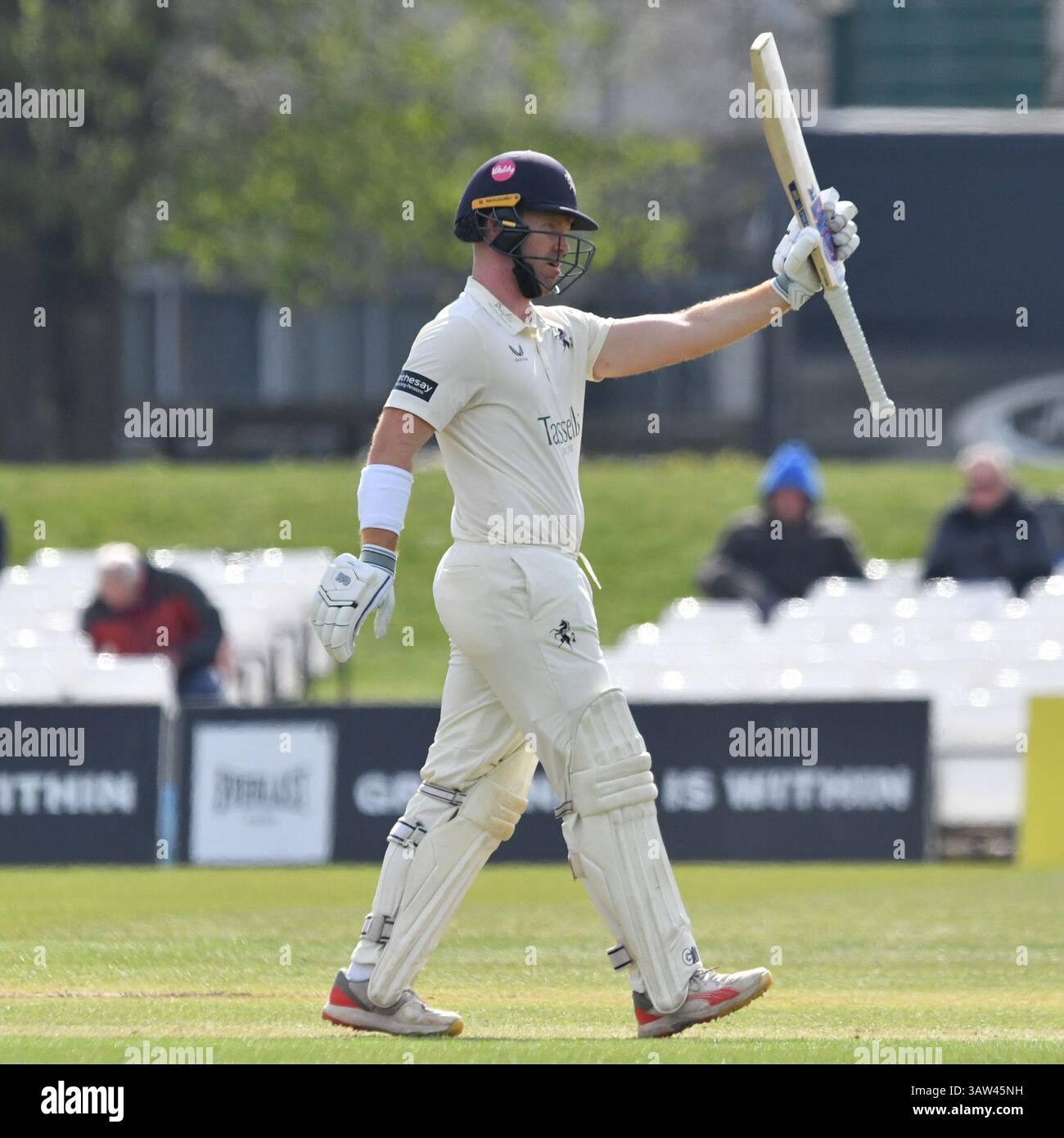 Canterbury, England. 19th Apr 2025. Ben Compton celebrates reaching a ...