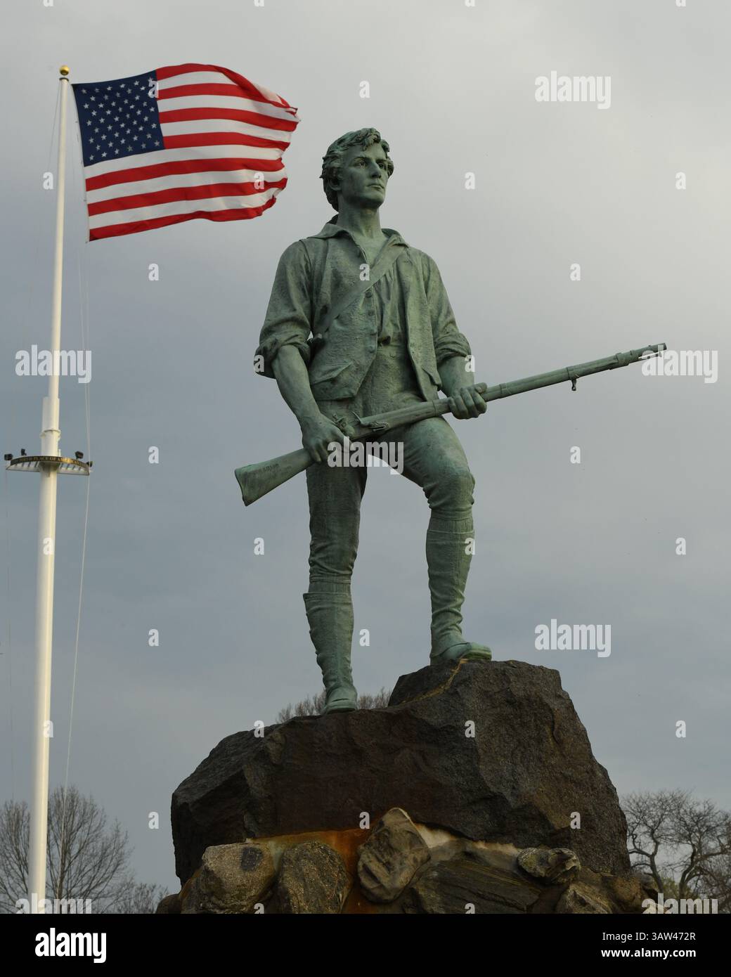 A life-size bronze statue representing Captain John Parker, the leader ...