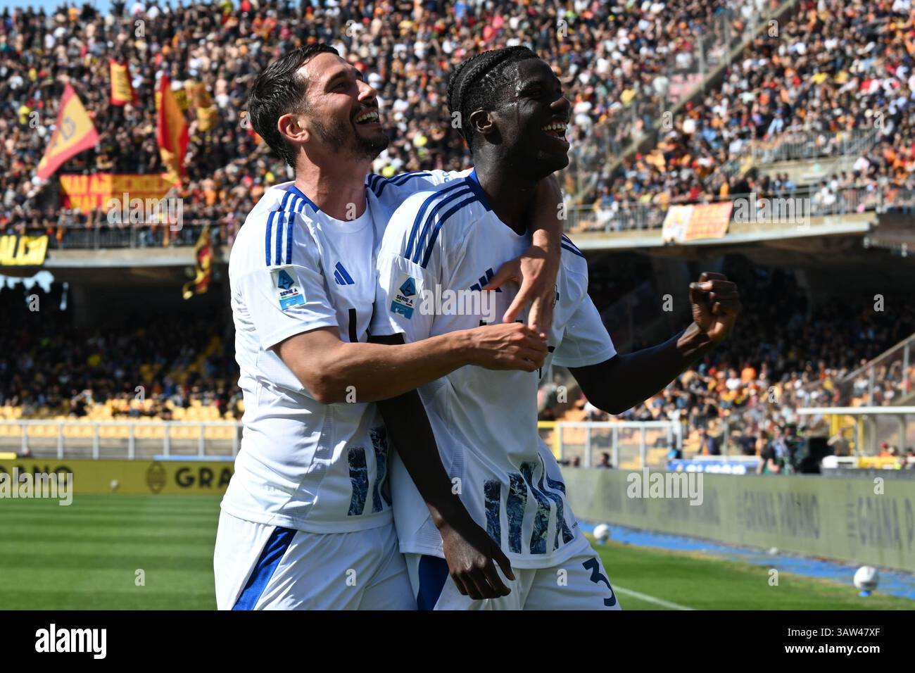 Lecce, Italy. 19th Apr, 2025. Assane Diao and Maximo Perrone (Como ...