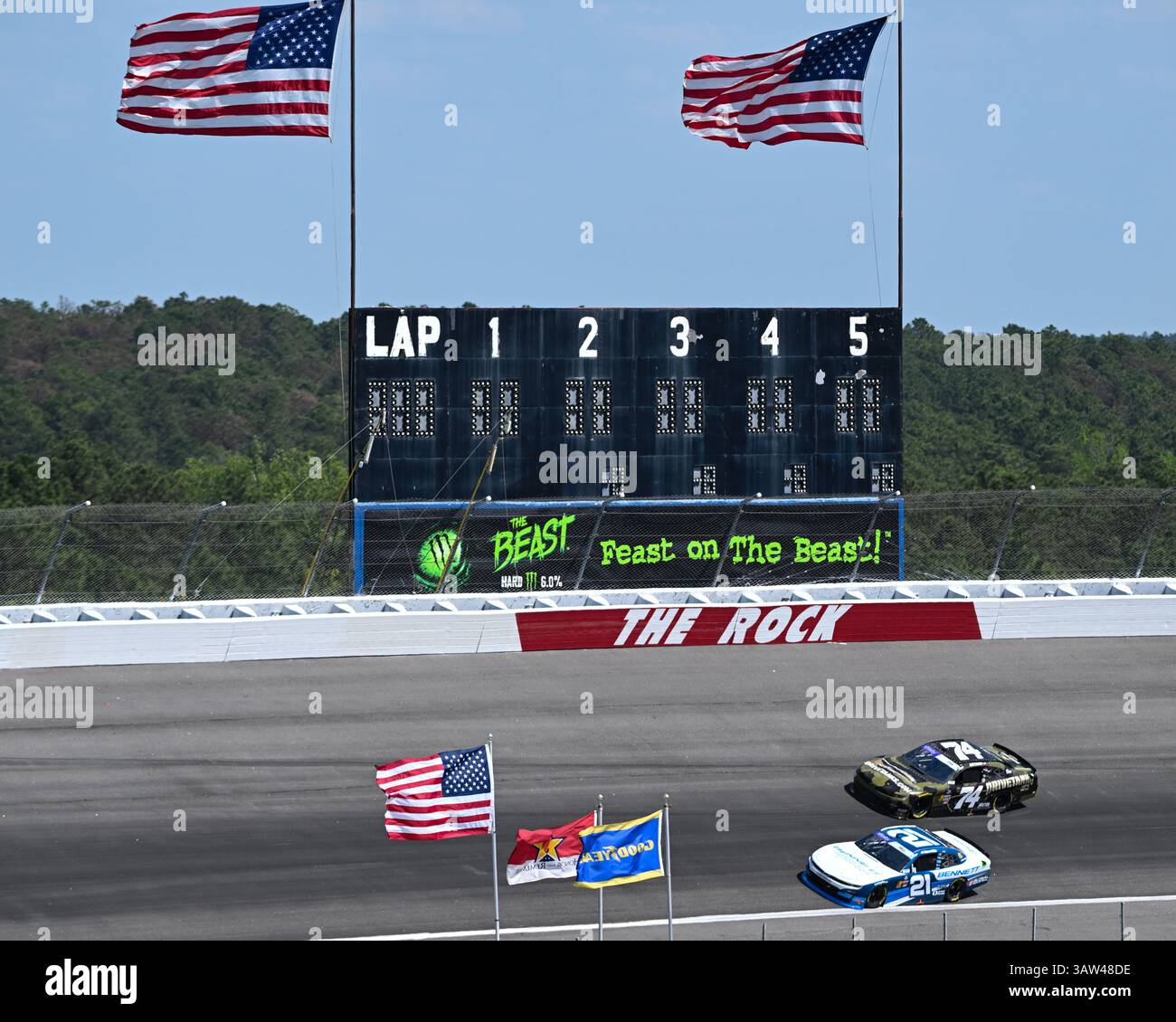 Rockingham, North Carolina, USA. 18th Apr, 2025. Cars run through turn ...