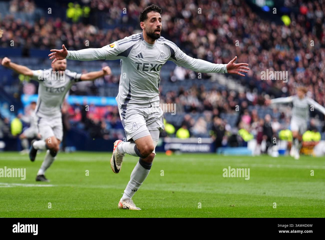 Aberdeen's Oday Dabbagh celebrates scoring his sides second goal during ...